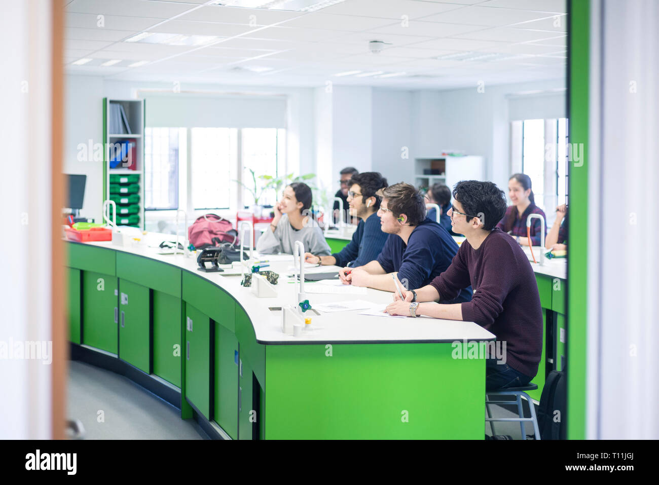 A classroom full of international students during a science lesson ...