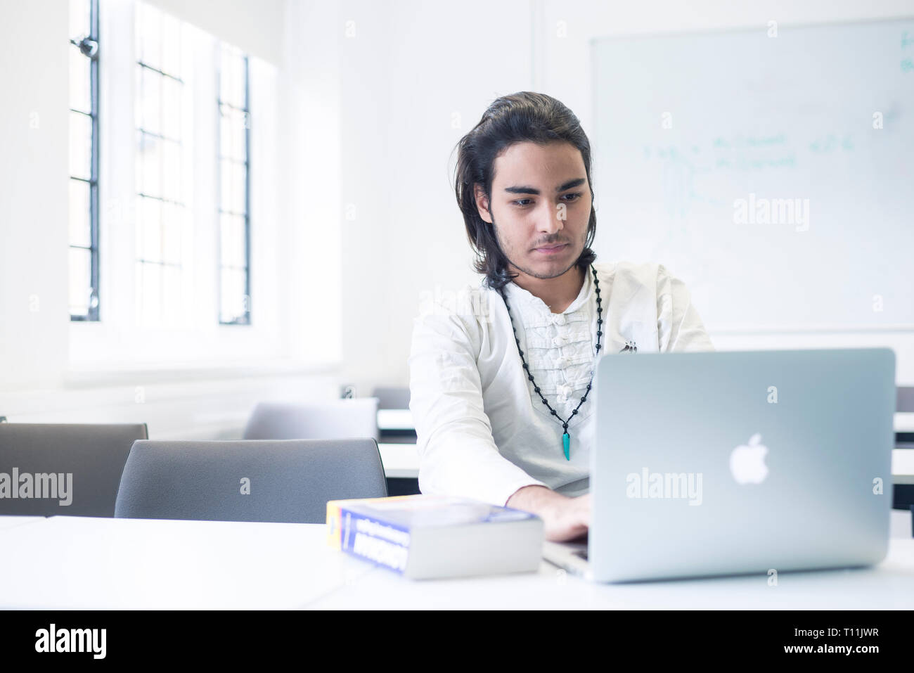 Arabic college students in classroom hi-res stock photography and ...