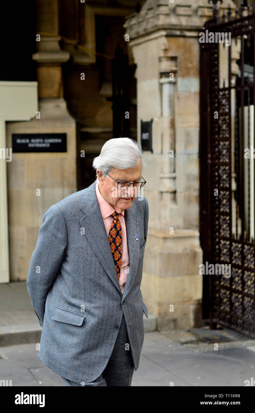 Kenneth Baker, Baron Baker of Dorking, walking past the Houses of ...