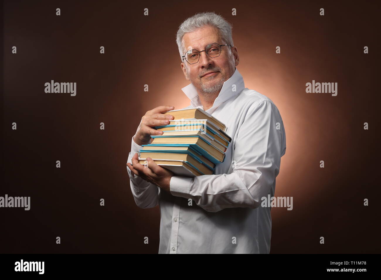 Scientific thinker, philosophy, elderly gray-haired man in a white ...