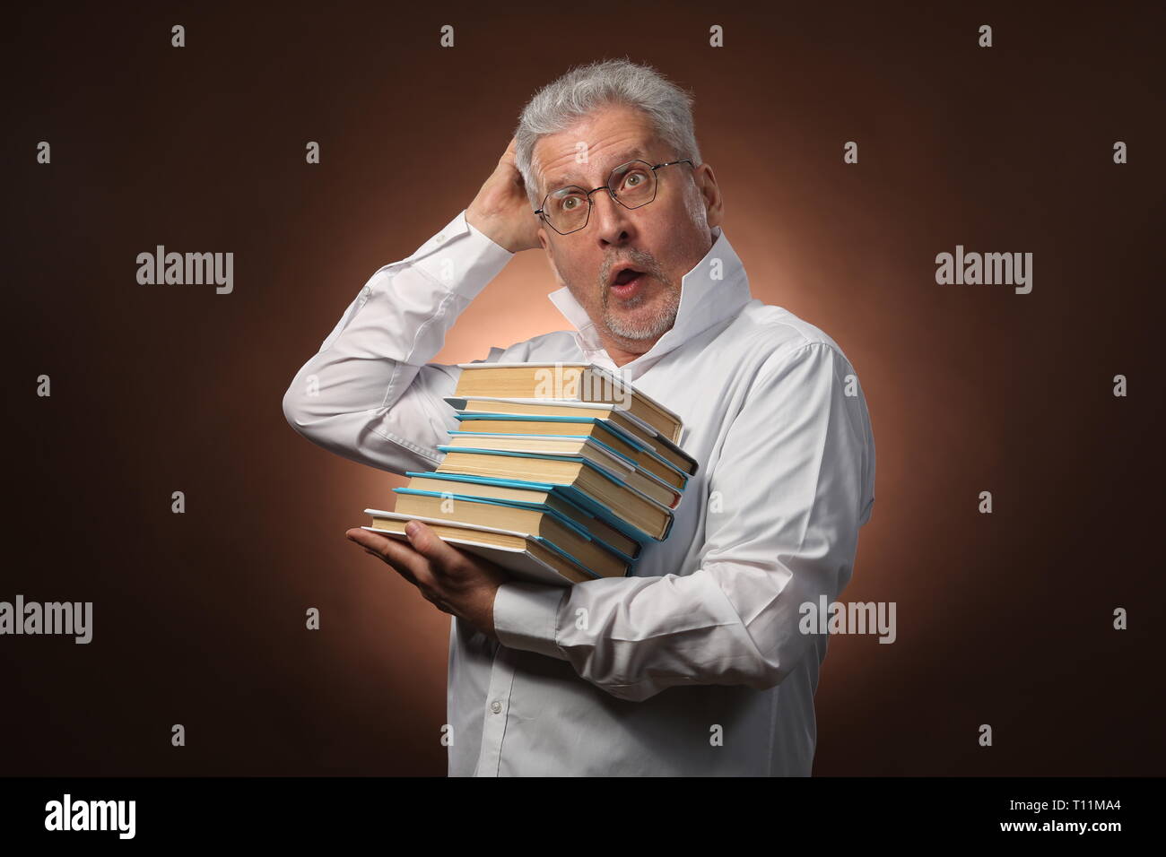 Scientific thinker, philosophy, elderly gray-haired man in a white ...