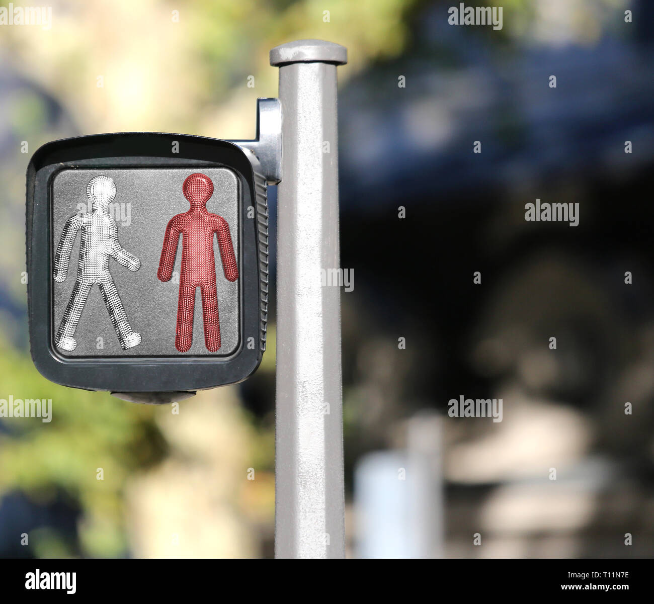 pedestrian signal light with symbol of a red man in the city Stock ...