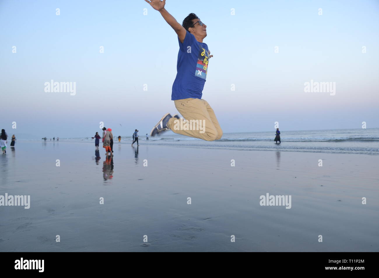 Beach jump hi-res stock photography and images - Alamy