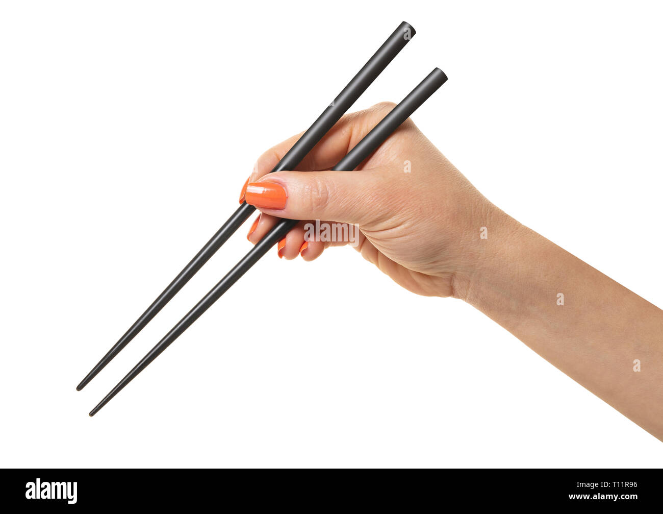 Hand using chopsticks hi-res stock photography and images - Alamy