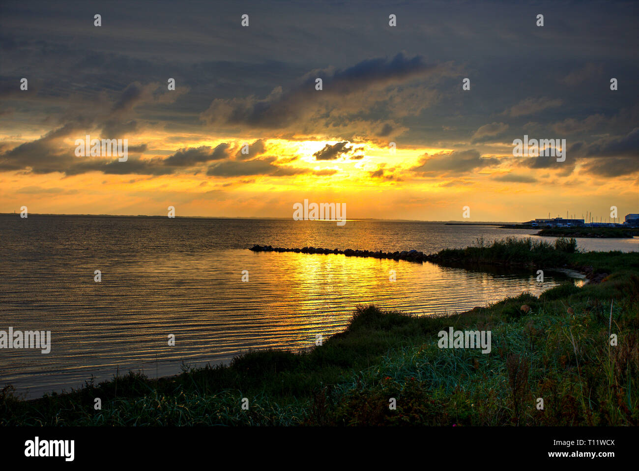 sundowner in denmark at the ringkobing fjord Stock Photo - Alamy