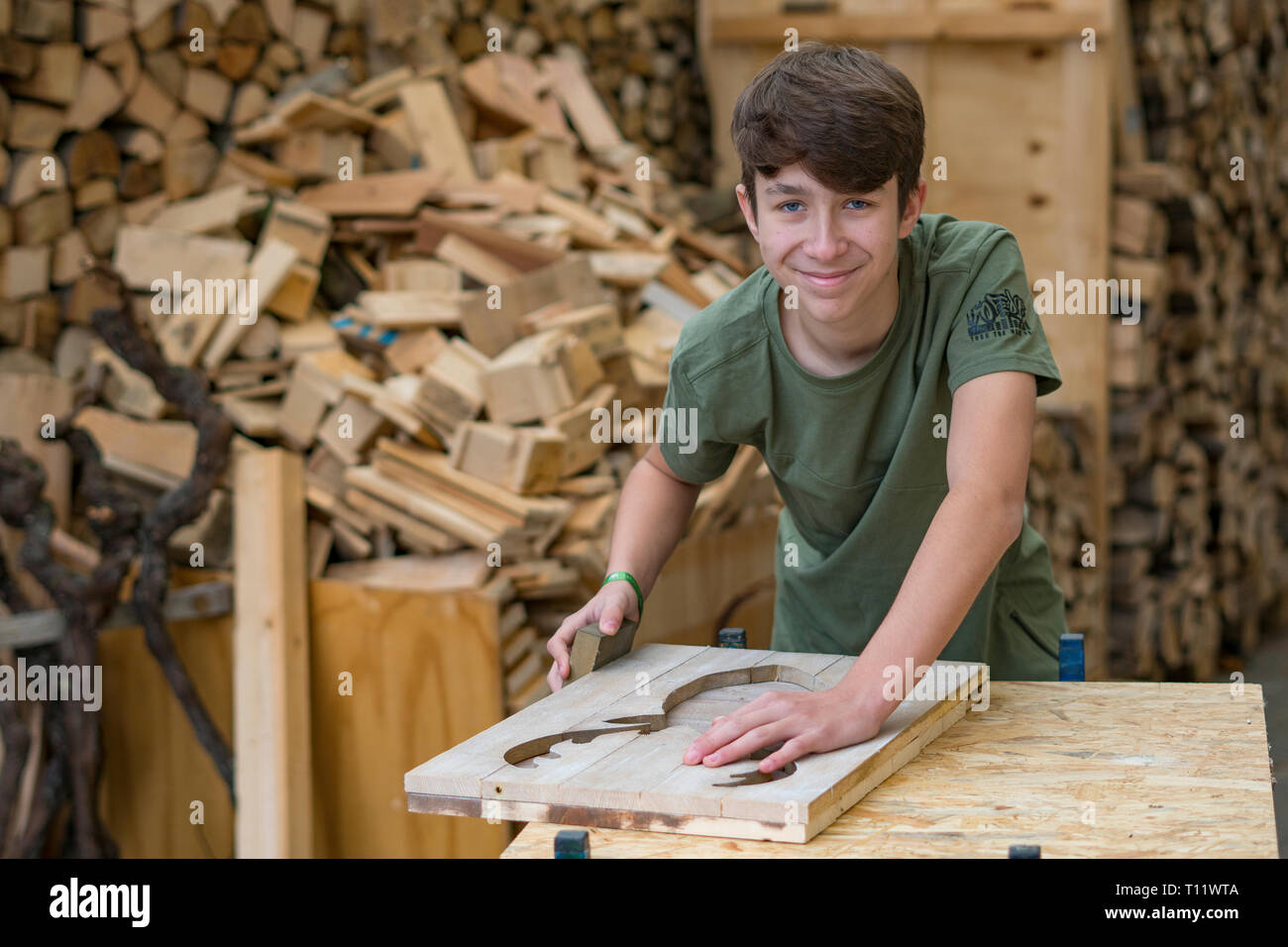 little student is working with wood Stock Photo - Alamy