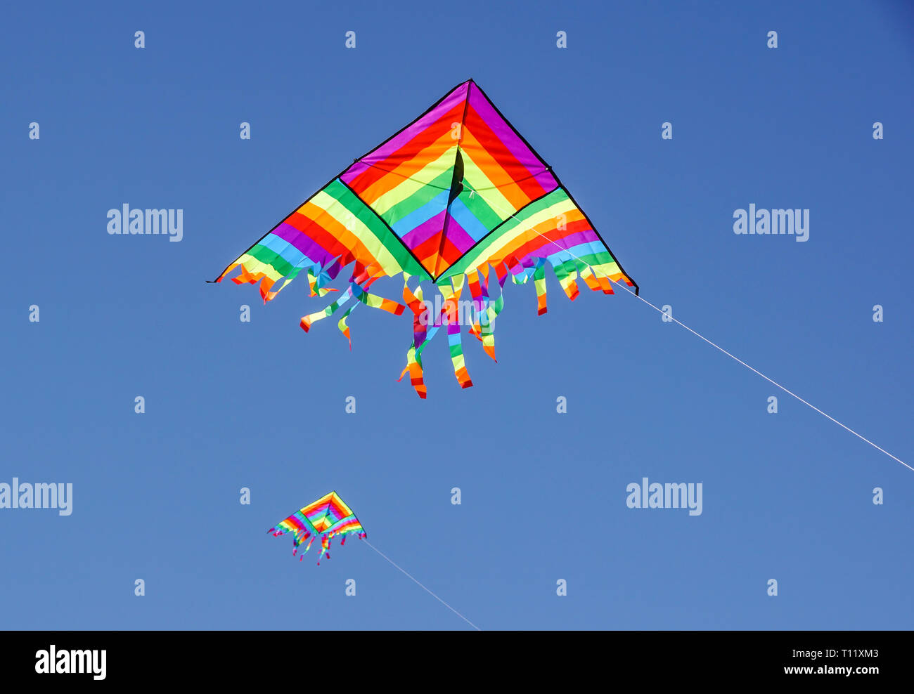 Beautiful kites in a kite festival ar blue sky Stock Photo - Alamy