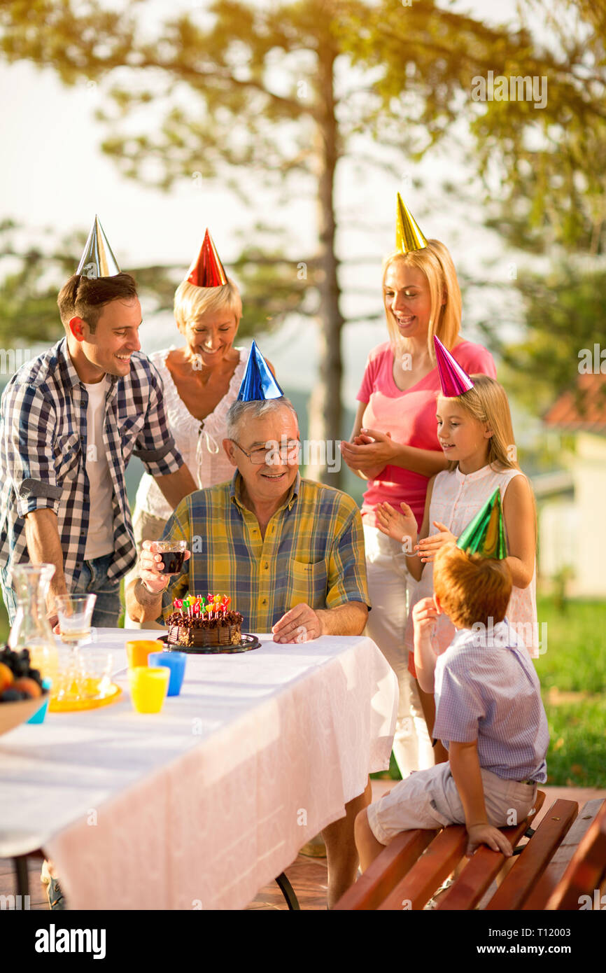 Happy family on birthday celebration together Stock Photo - Alamy