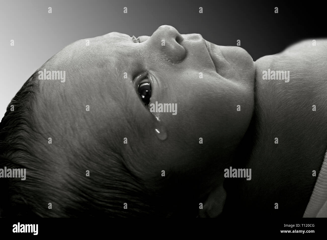 Newborn baby with tear. MR available Stock Photo - Alamy