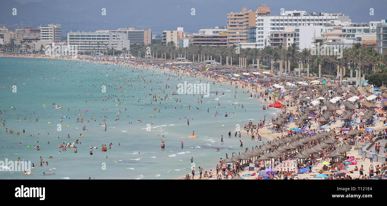 El Arenal Mallorca, Spain - August 11, 2018 - tourists sunbathe in El Arenal Beach in the ...