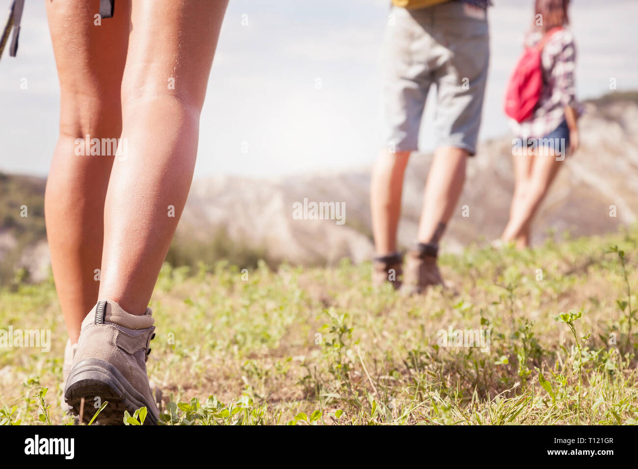 hiking legs walking on mountain grass Stock Photo - Alamy