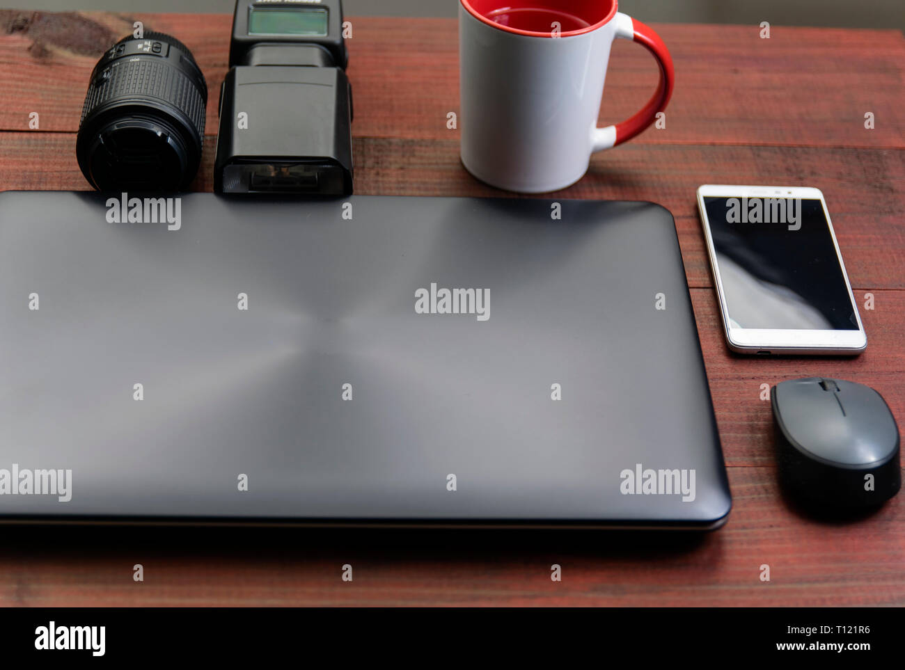 Laptop, flash, cell phone Stock Photo - Alamy