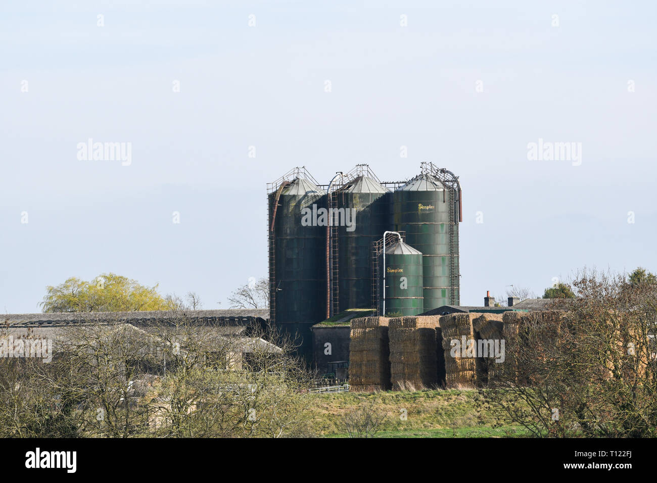 grain silos on a farm in leicestershire england Stock Photo - Alamy