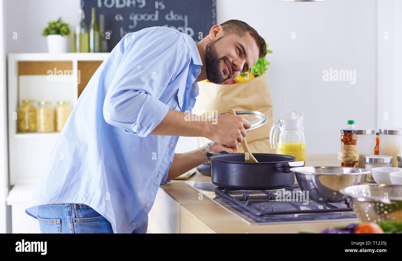 Male chef in a kitchen hi-res stock photography and images - Alamy