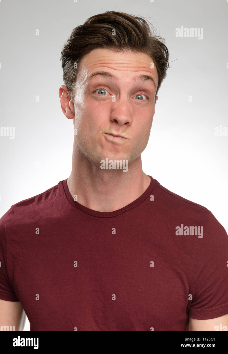 portrait series of a young white man with different facial expressions ...