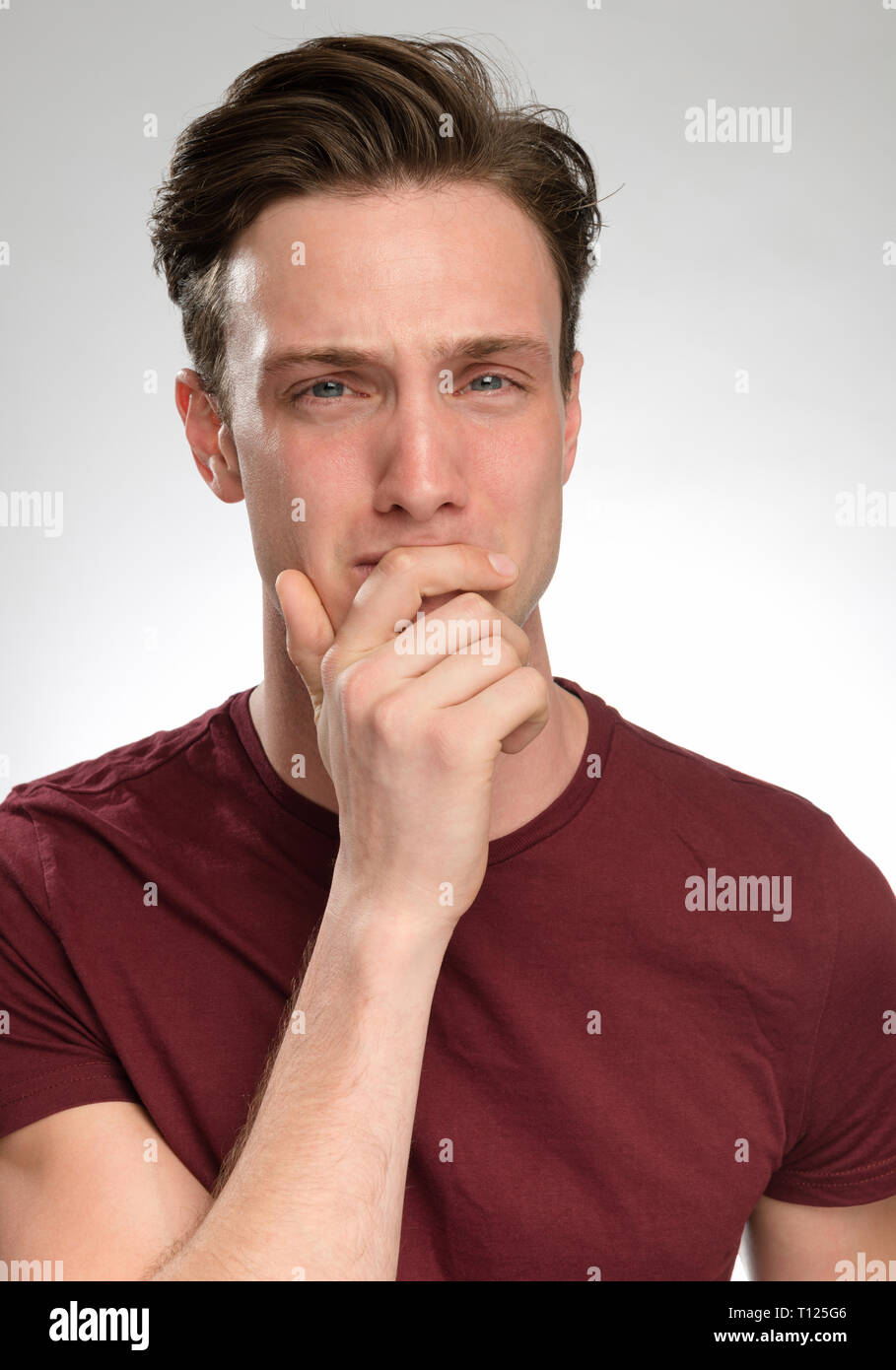 portrait series of a young white man with different facial expressions ...