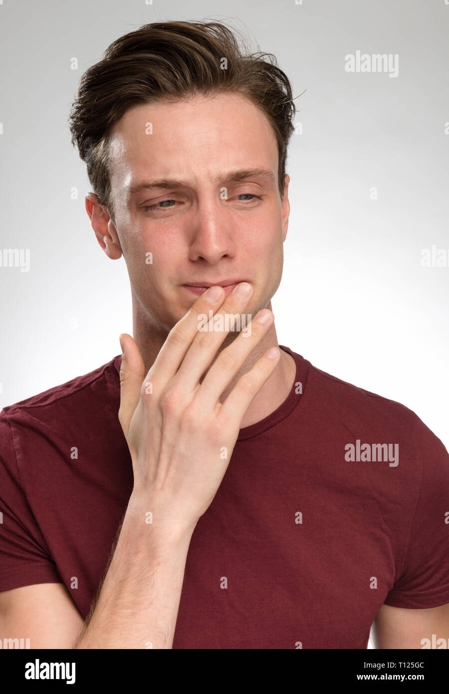 portrait series of a young white man with different facial expressions ...