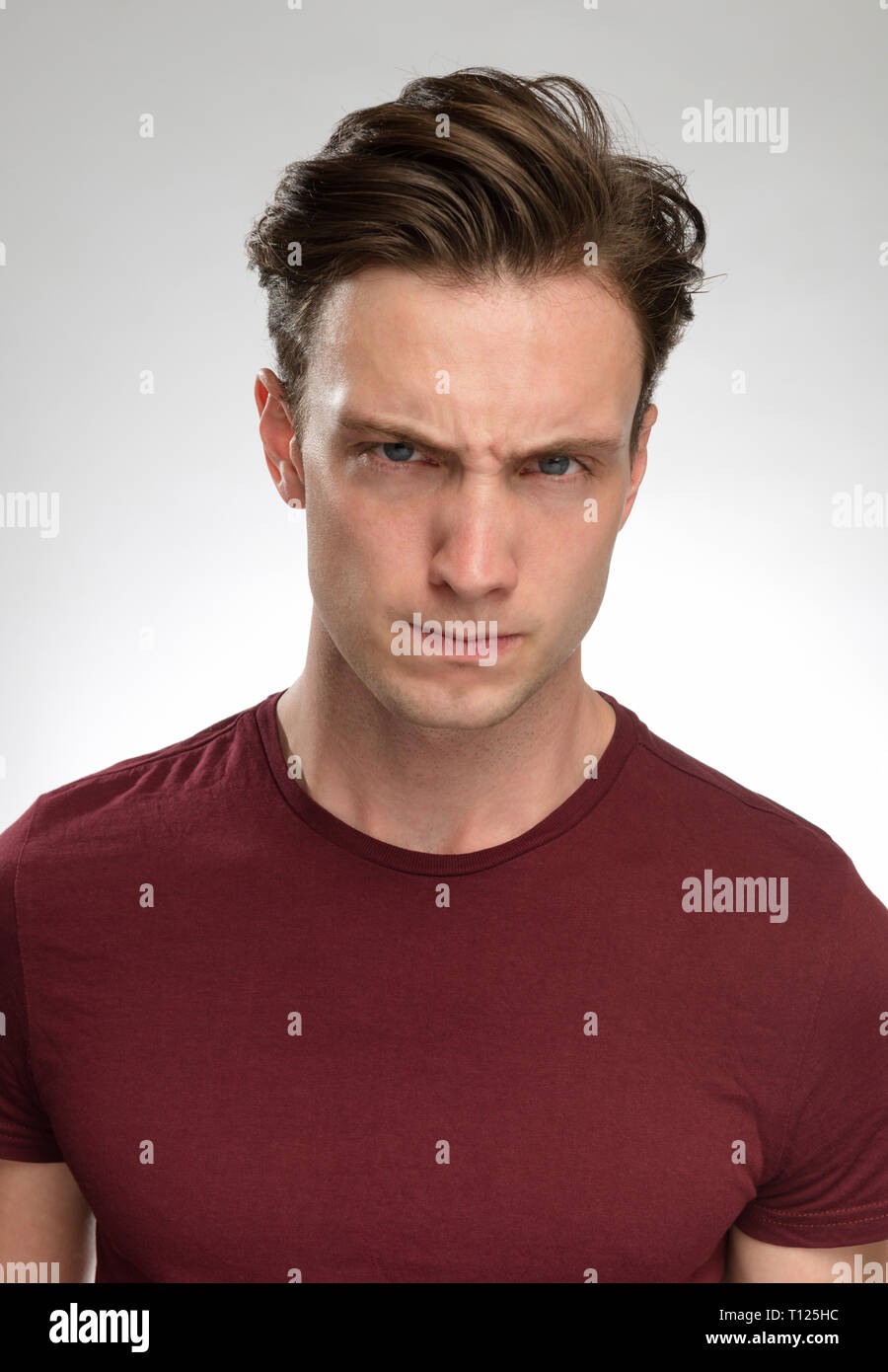 portrait series of a young white man with different facial expressions ...
