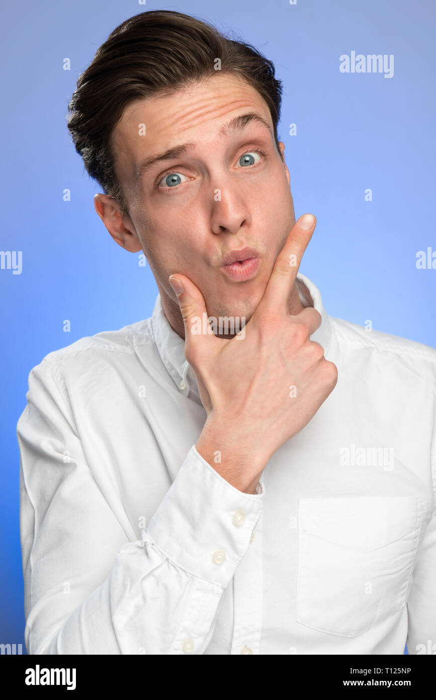 portrait series of a young white man with different facial expressions ...