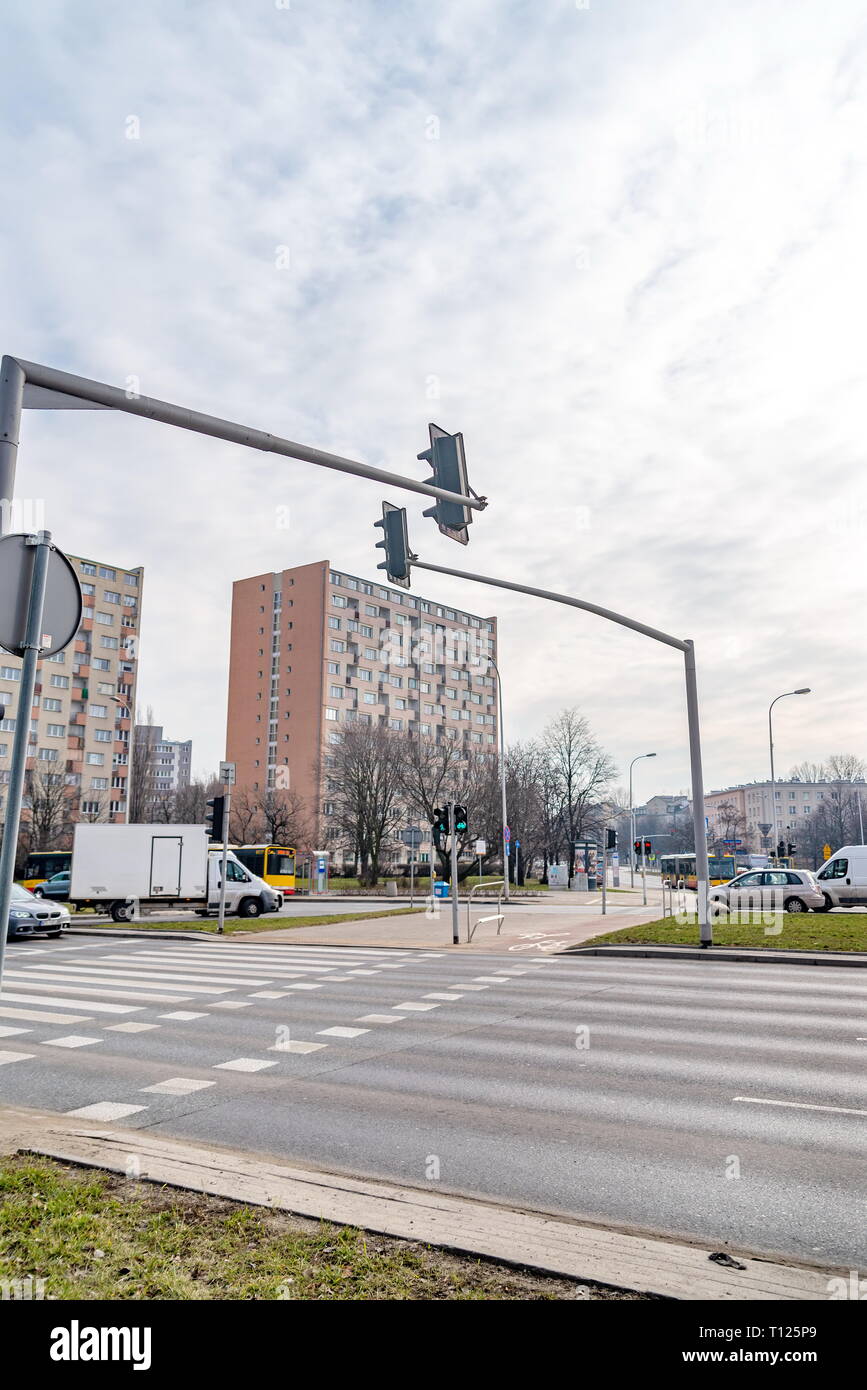 Two traffic lights on long horizontal pillars above the road Stock ...