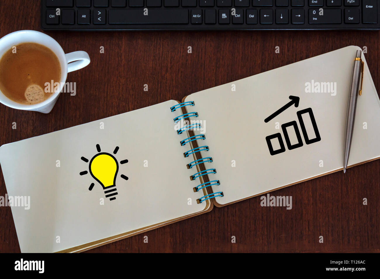 Office desk with computer, coffee cup, and notebook with Lamp and ...