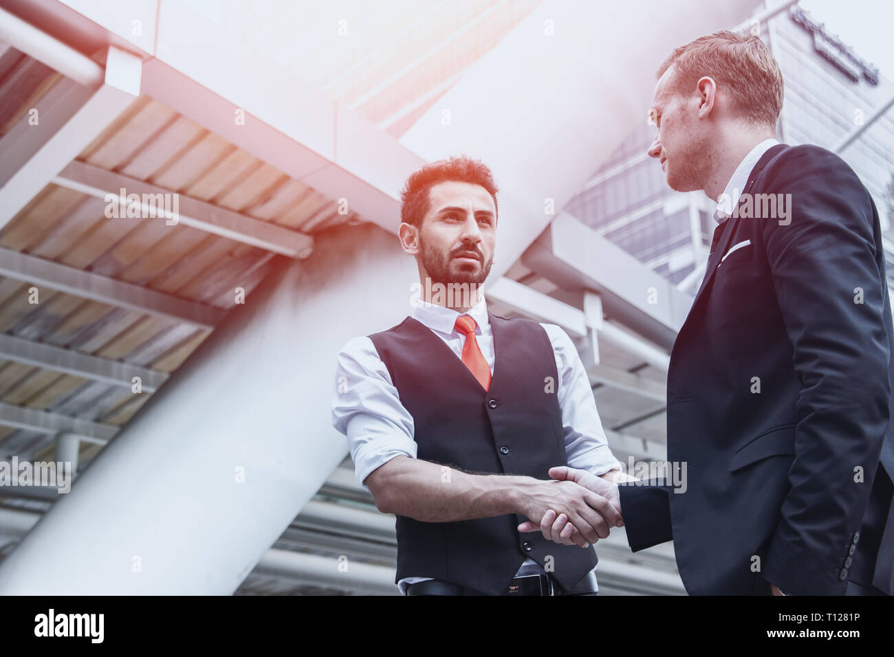 Two business people hand shake hi-res stock photography and images - Alamy
