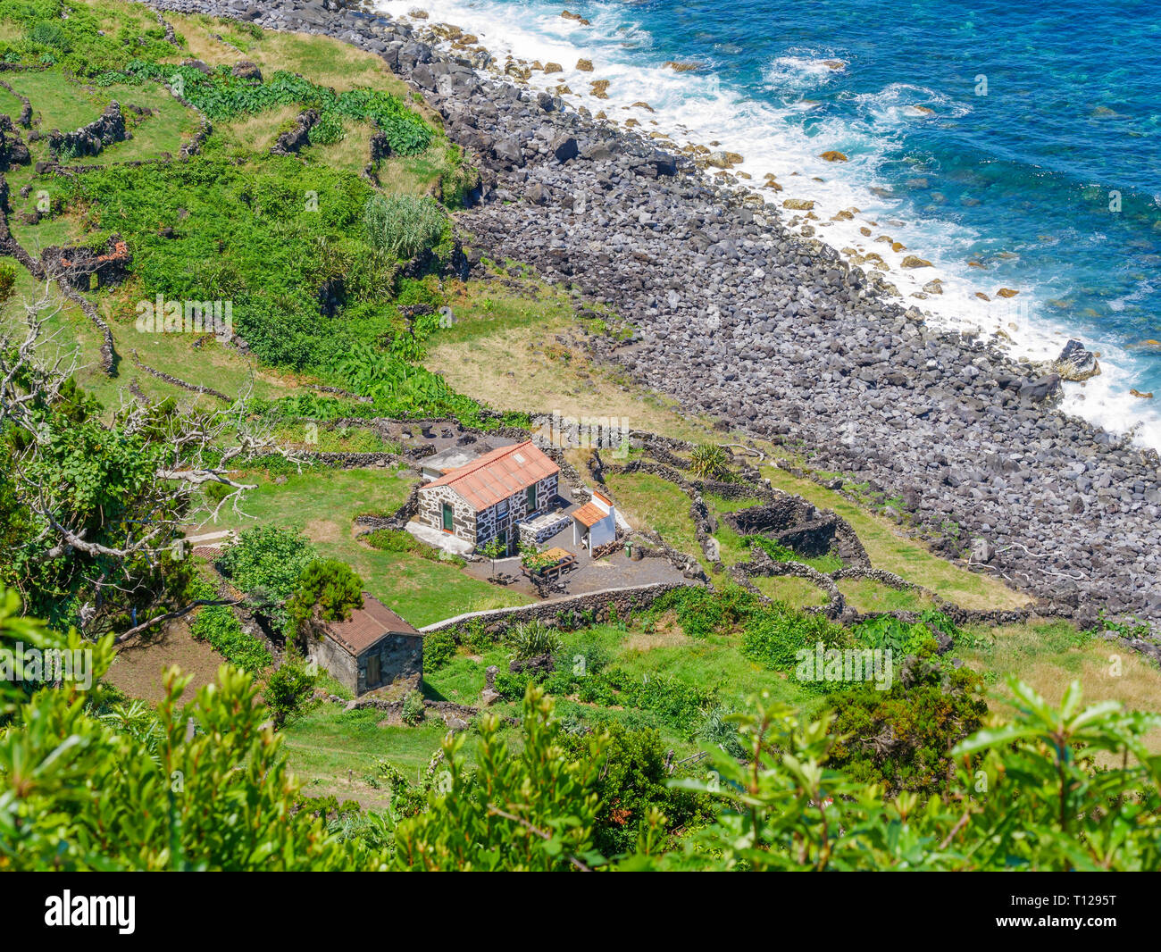 Cultural image of traditional stone house on the coastline of the ...