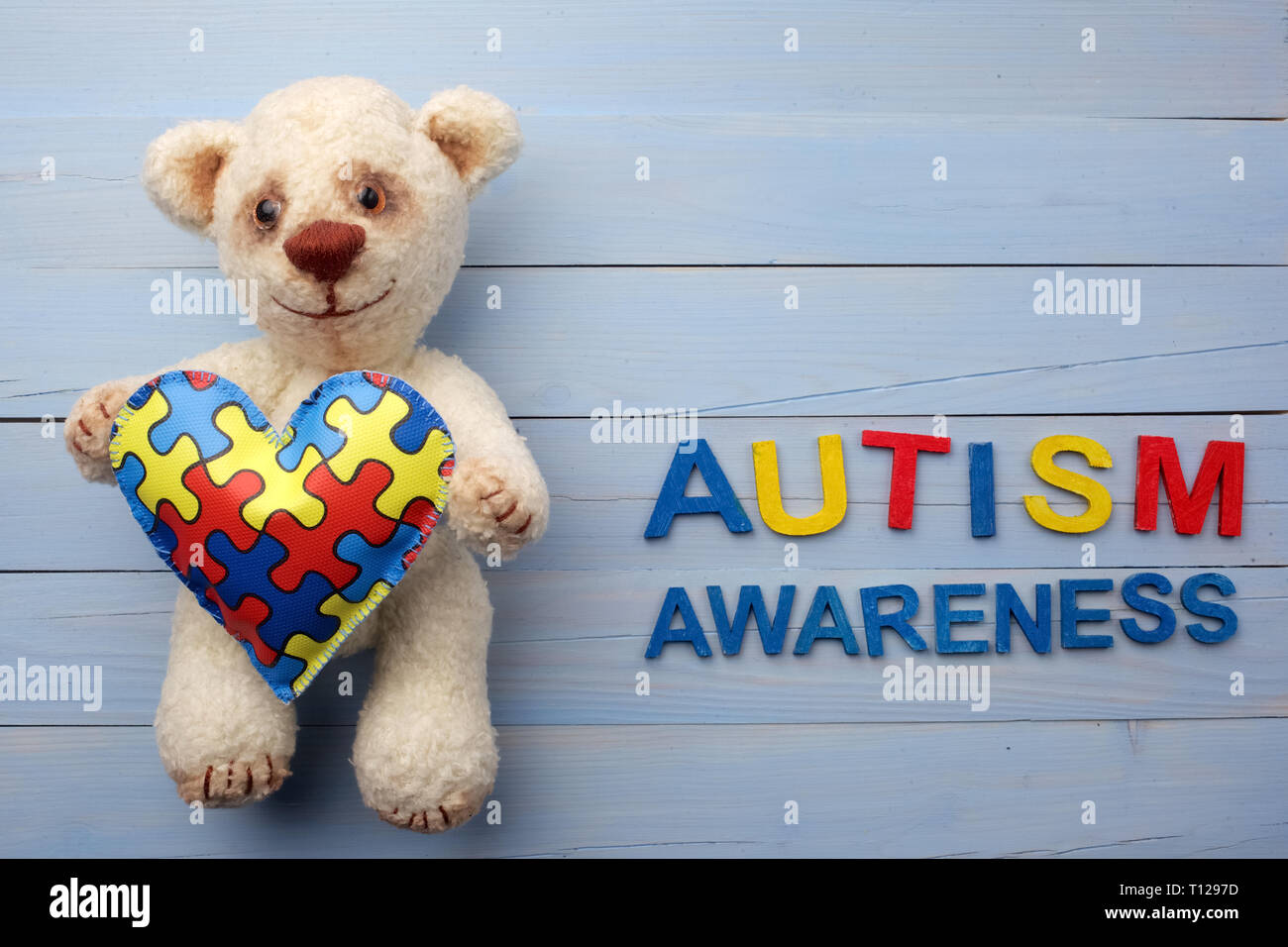 World Autism Awareness day, mental health care concept with teddy bear ...