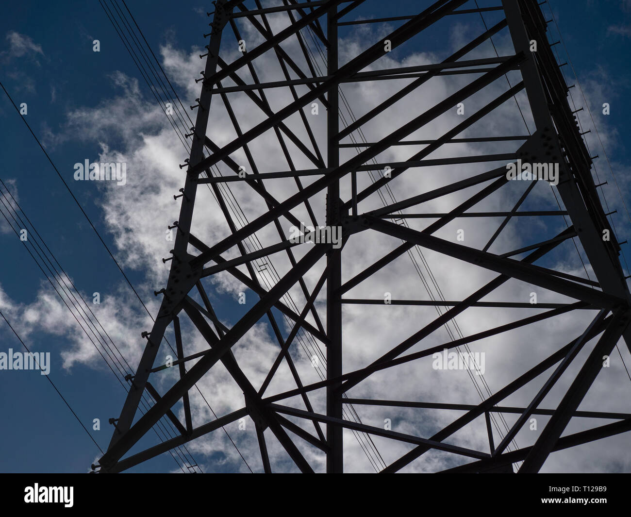 Image of power pole with cloudy background Stock Photo - Alamy