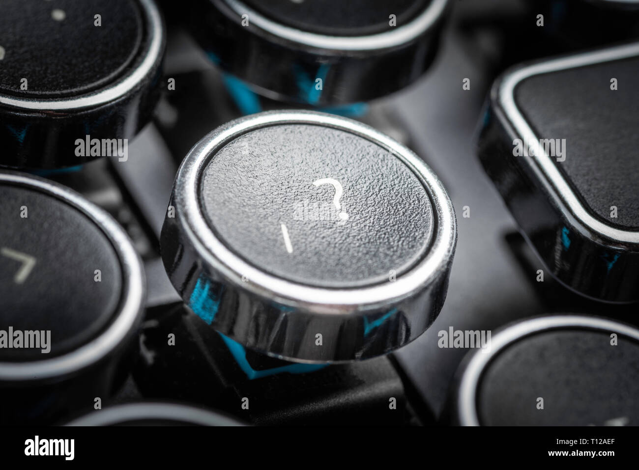 An extreme close-up or a macro shot of black circular metal keyboard ...