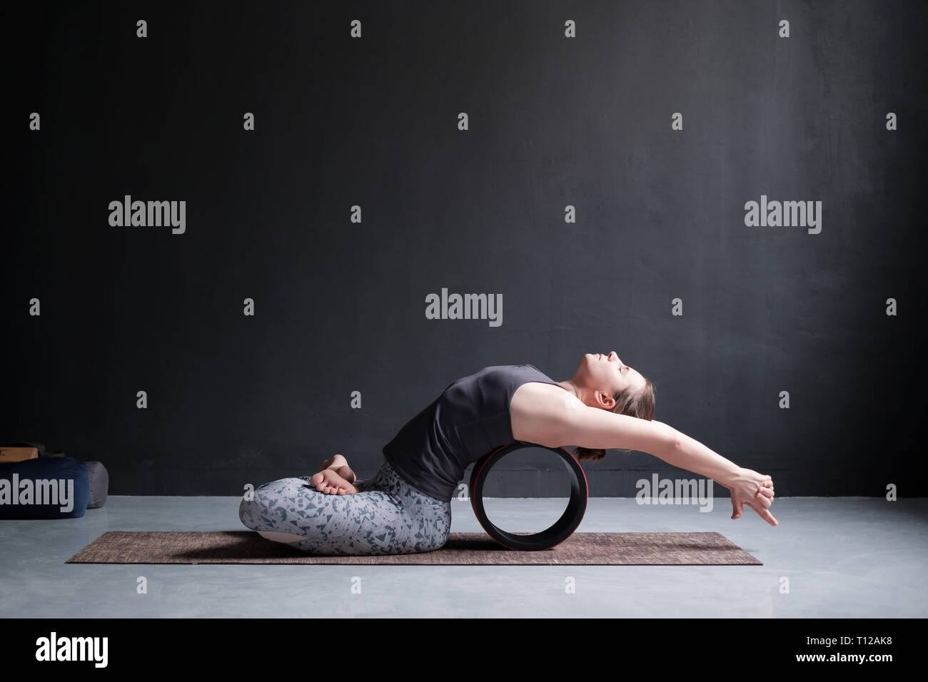 woman practices yoga asana Matsyasana, fish pose Stock Photo - Alamy
