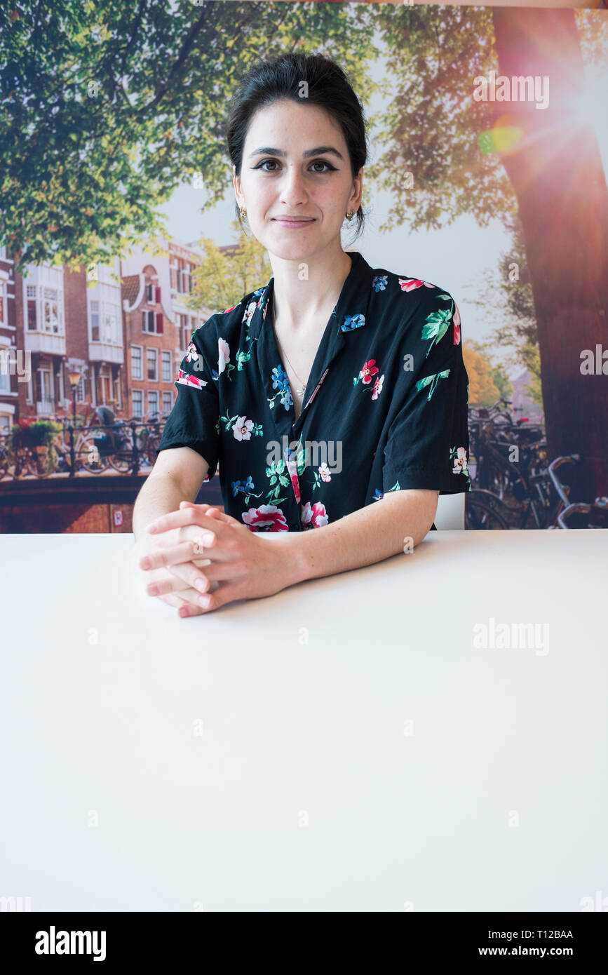 A young female student poses for a photo in an education establishment ...