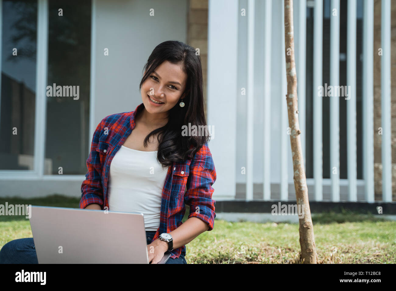 attractive college student portrait in the park Stock Photo - Alamy