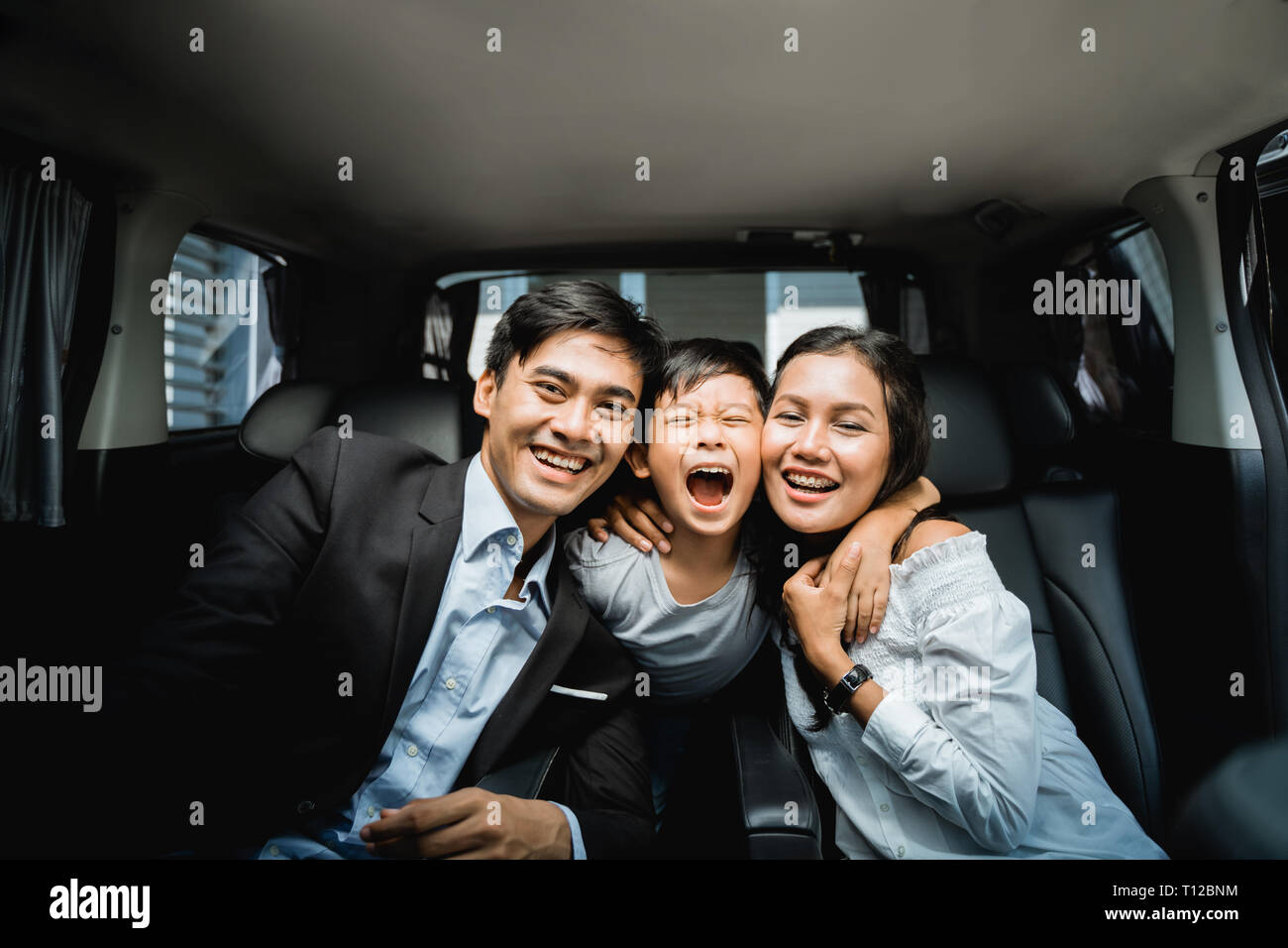 couple business family with their kid Stock Photo - Alamy
