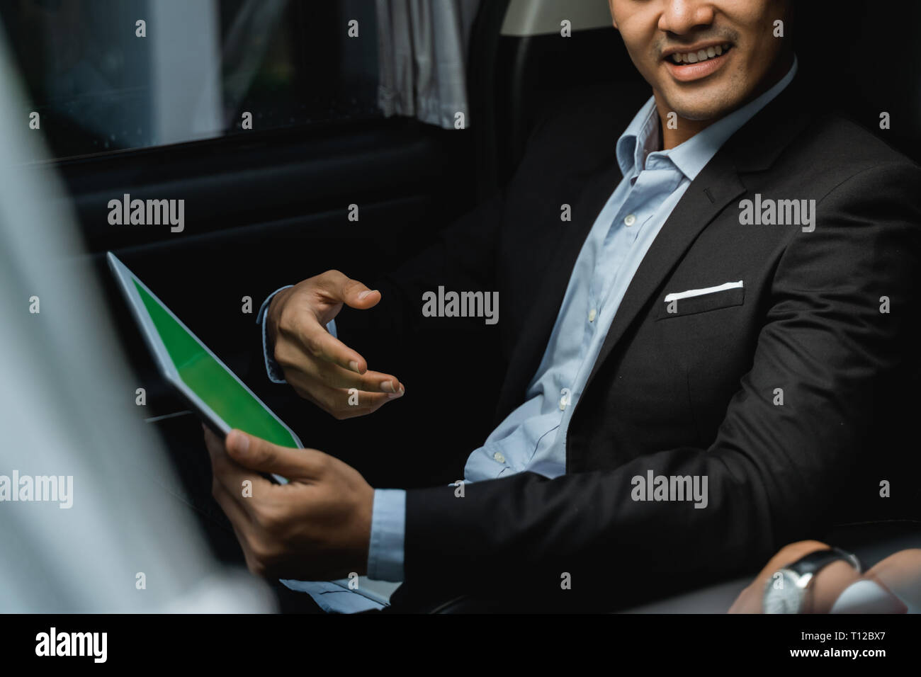 young business people meeting in the car Stock Photo - Alamy