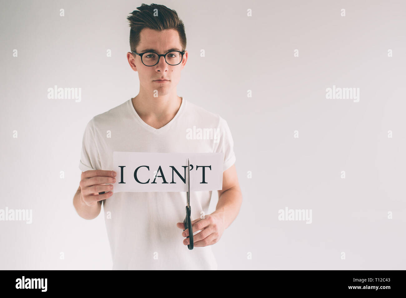 man cutting a paper with text I can't Nerd is wearing glasses Isolated ...