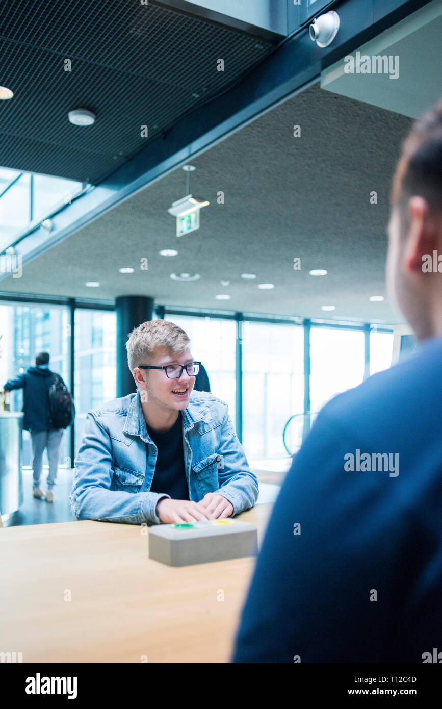 People Chatting Around A Table High Resolution Stock Photography and ...