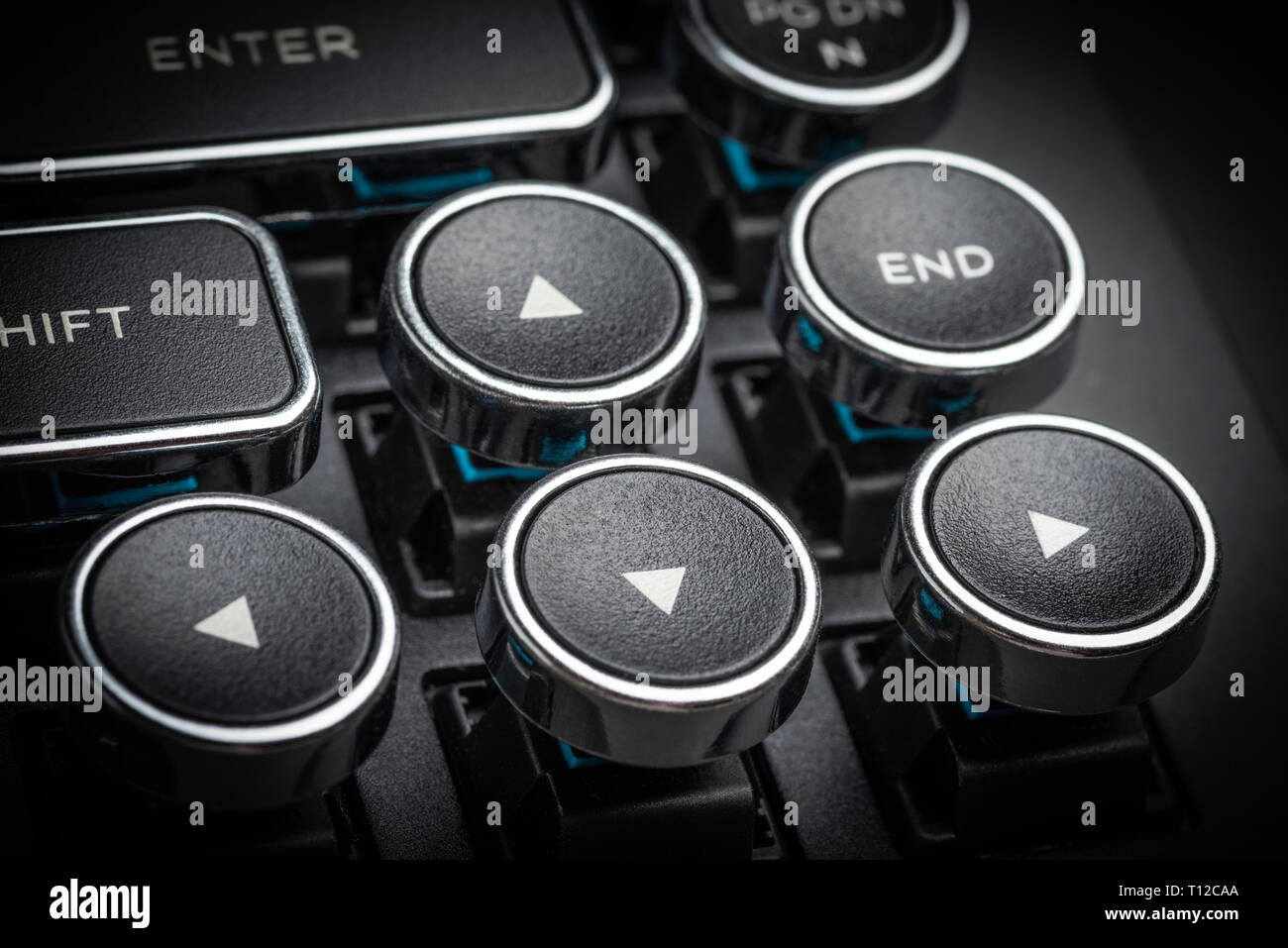 An extreme close-up or a macro shot of black circular metal keyboard ...