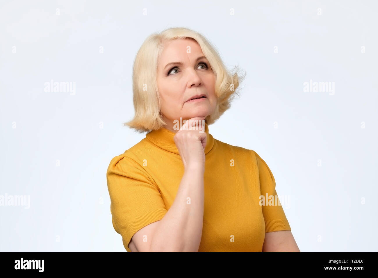 Portrait face thinking senior hi-res stock photography and images - Alamy
