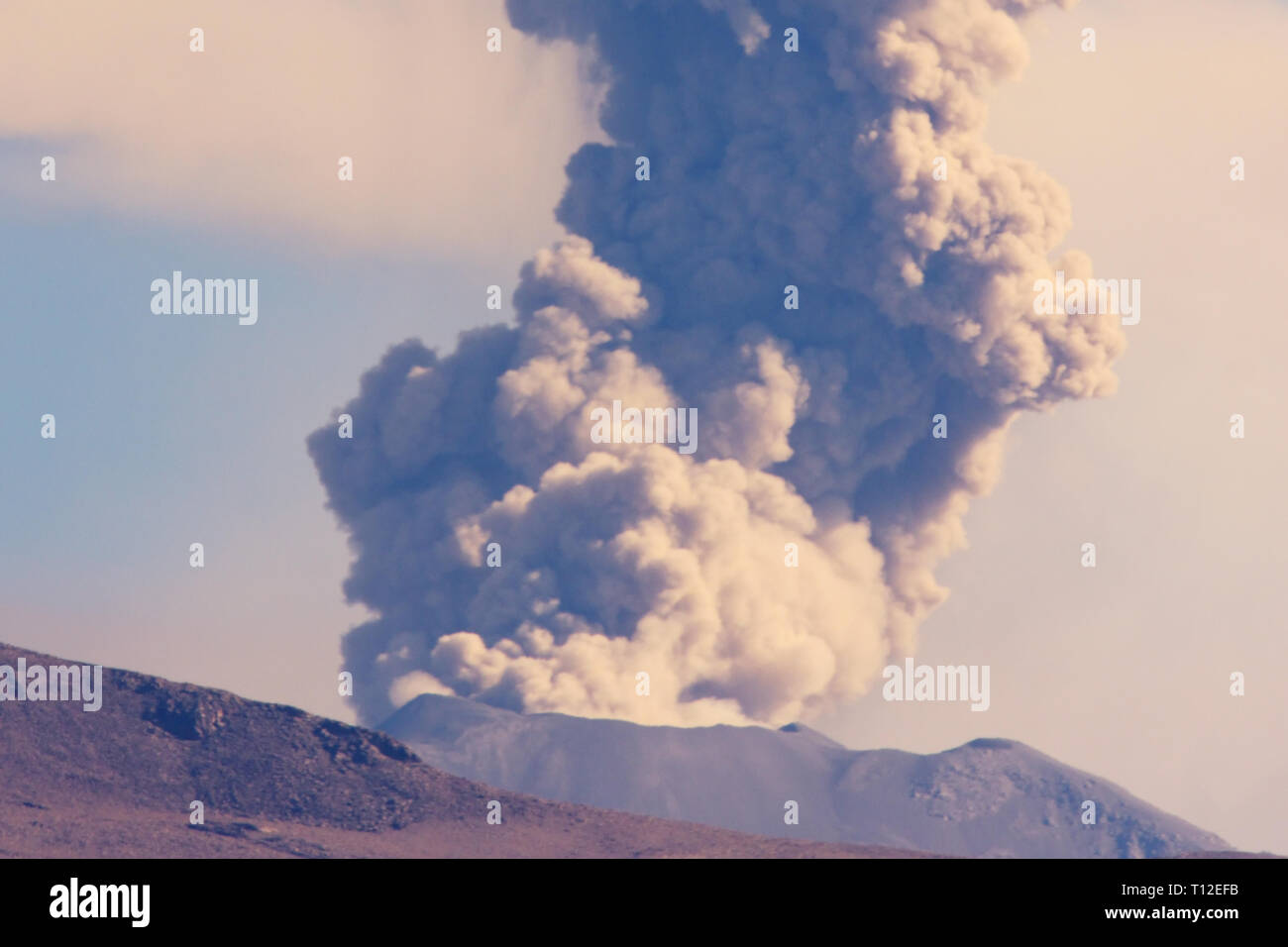 Sabancaya Volcano, column of smoke and ash as it erupts in July 2017 ...