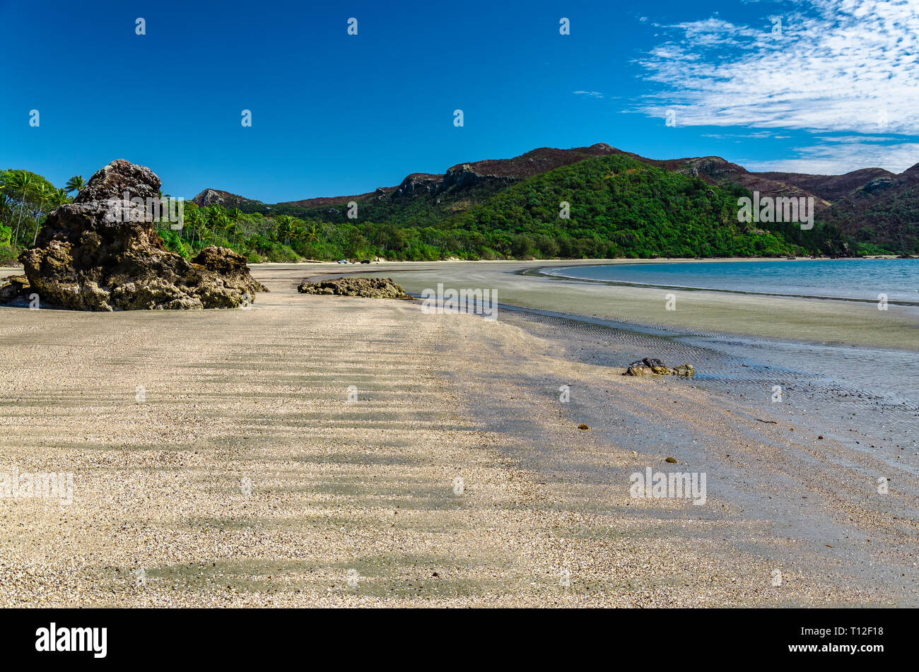 A rock formation on a beach in tropical Queensland, Australia Stock ...