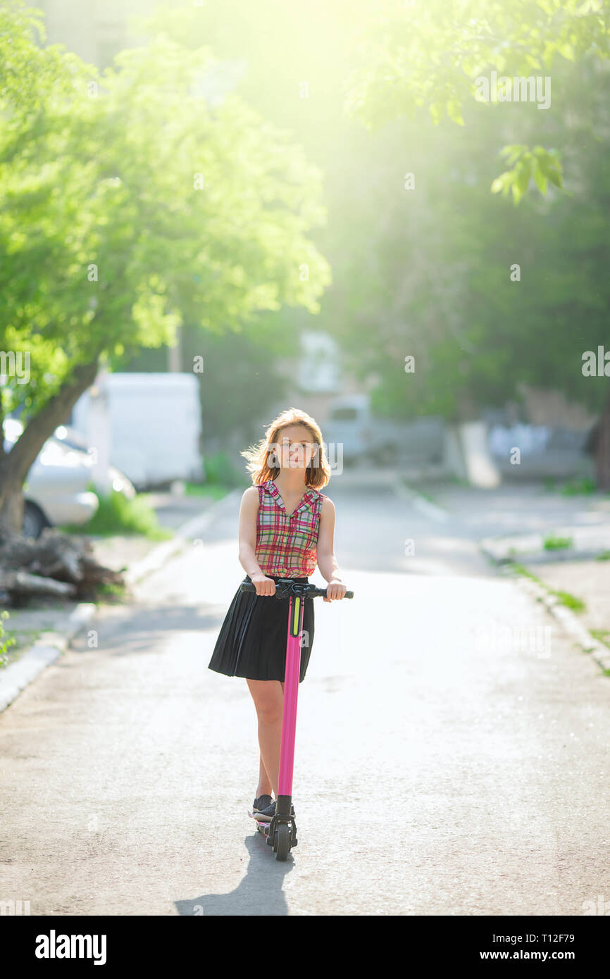 Teen scooter hi-res stock photography and images - Alamy