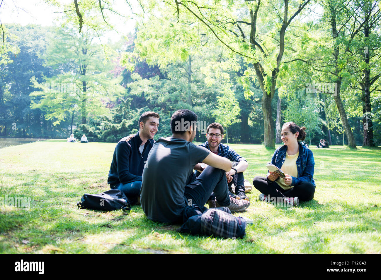 Group college students talking outside hi-res stock photography and ...