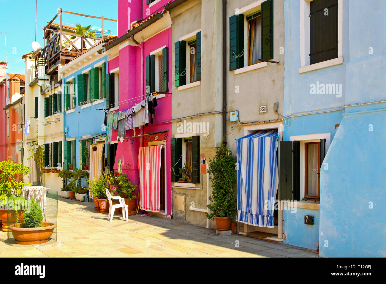 Old retro Mediterranean street with colorful houses Stock Photo - Alamy