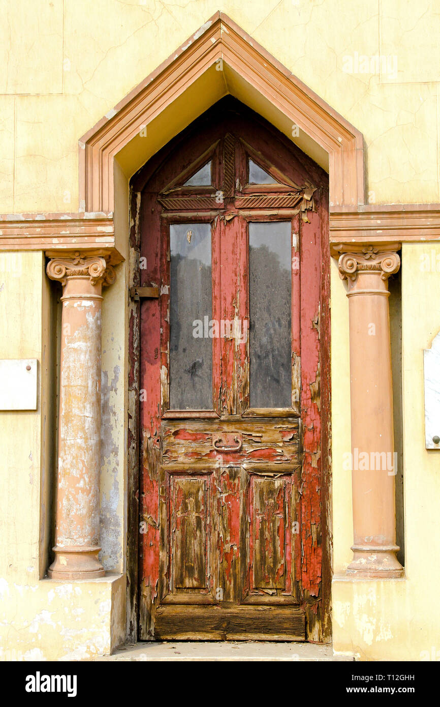 Old grunge wooden door in unusual shape Stock Photo - Alamy