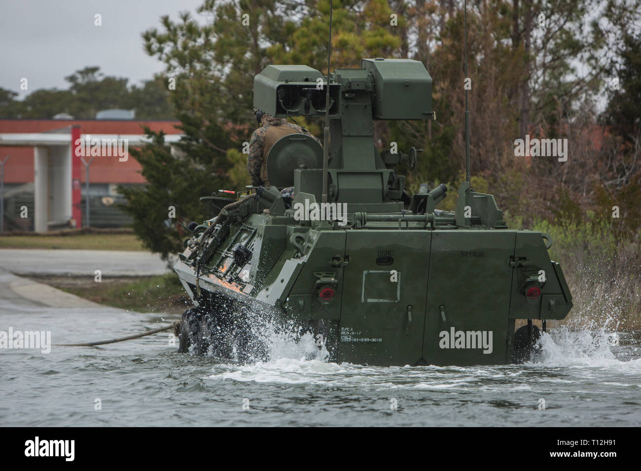 U.S. Marines with Company C, 2nd Light Armored Reconnaissance Battalion ...
