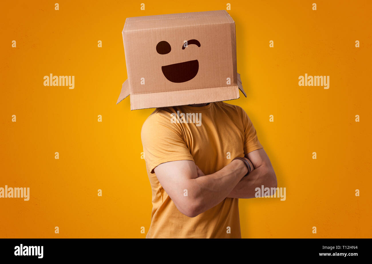 Funny man wearing cardboard box on his head with smiley face Stock ...