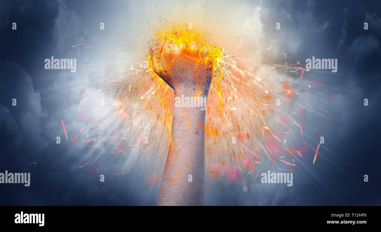 Hand hits strongly and makes fire beam around Stock Photo - Alamy