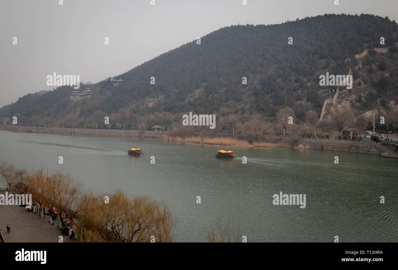 The walk way along and the bridge with the Chinese style at the Longmen ...