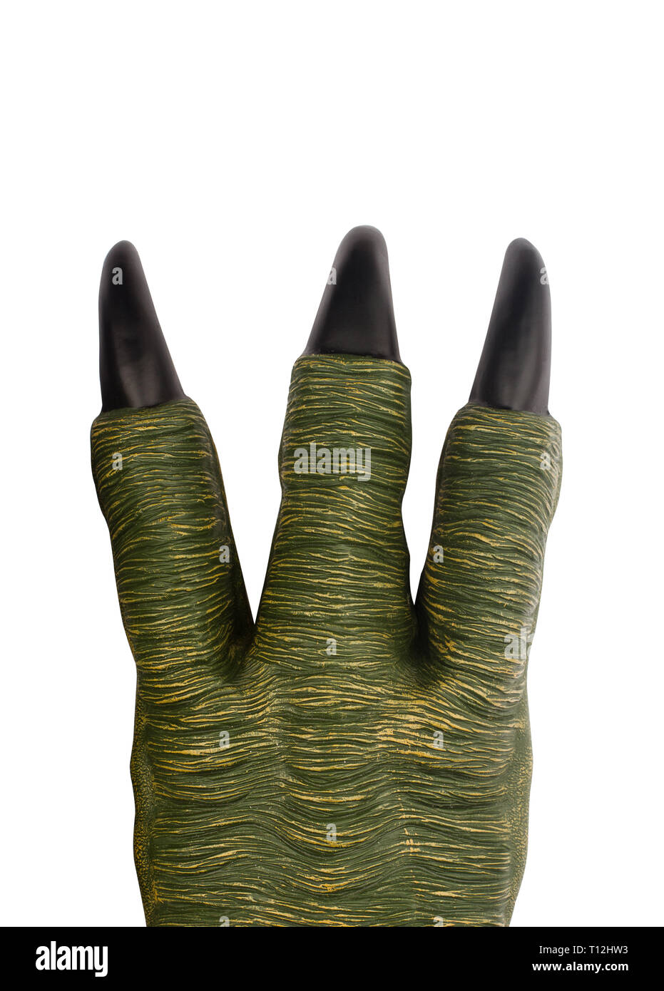 top view of large green toy monster paw with big black claws and three ...